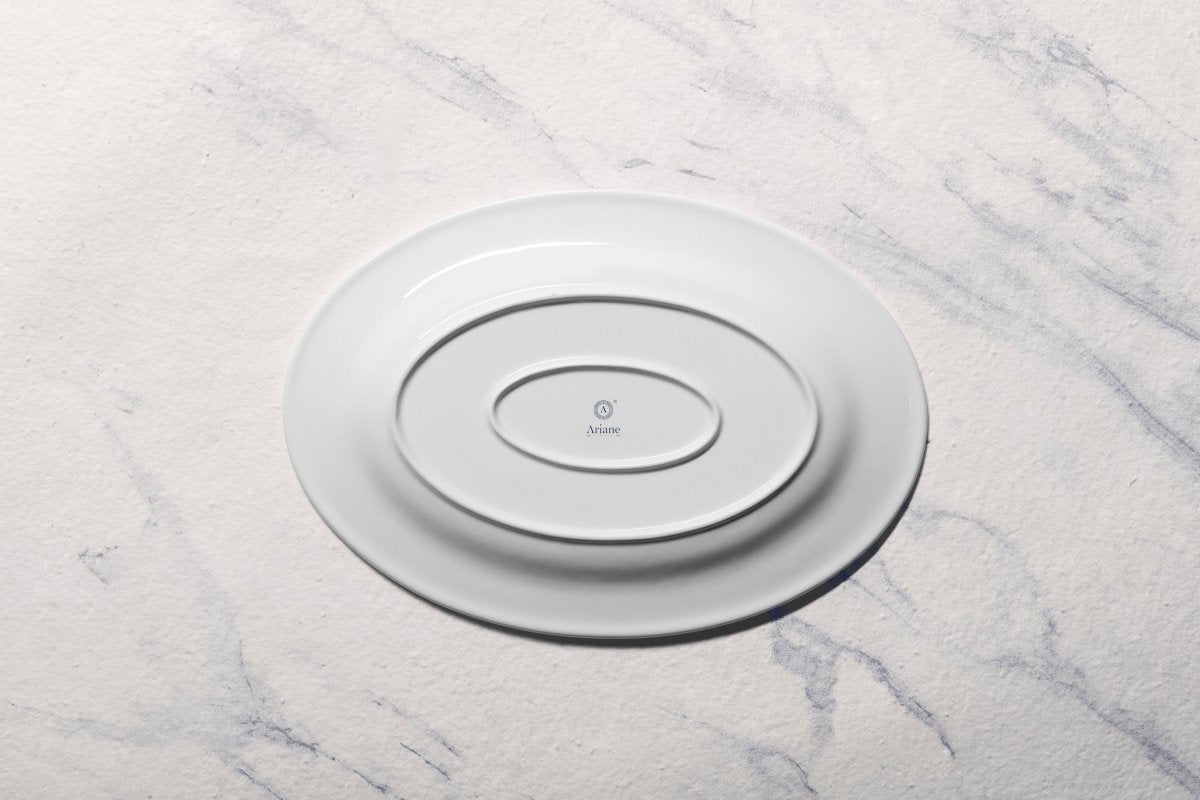 Ariane Prime 12 3/5'' x 8 2/3'' Orba White Porcelain Oval Platter - 6/